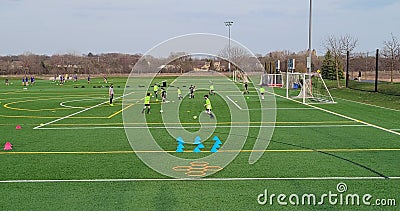 Boys Practicing Soccer on a Multi-use Ball Field Stock Footage - Video ...