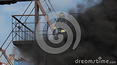 Brave Firefighter Going Down the Ladder in Fire Stock Video - Video of ...