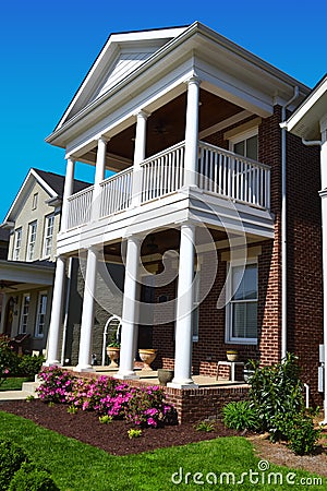 Brick Cape Cod Style Home With Porch Stock Image - Image: 24324771