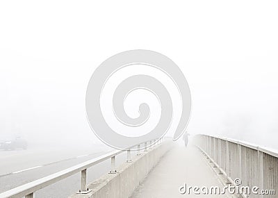 Bridge And Distant Man Fade Into Mist Stock Photography - Image: 23966342