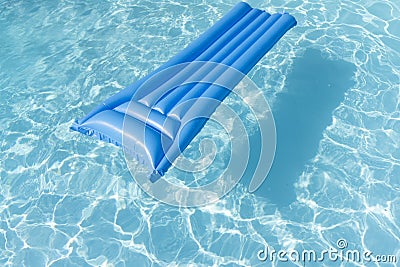 Bright Blue Summer Pool Lounger Float On A Rippled Swimming Pool ...