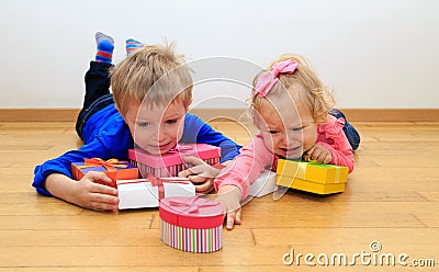 Brother And Sister Rivalry Concept, Sorting Presents Royalty-Free Stock ...