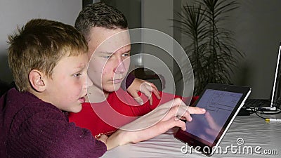 Brothers Using Tablet while Working with Blueprint Stock Video - Video ...
