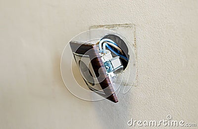 Brown Broken Electrical Socket Fell Out Of The Wall. The Socket Is Torn ...