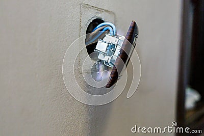 Brown Broken Electrical Socket Fell Out Of The Wall. The Socket Is Torn ...