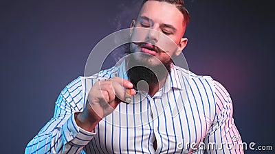 Brutal and Handsome Bodybuilder with Beard and Moustache Smoking Cigar ...