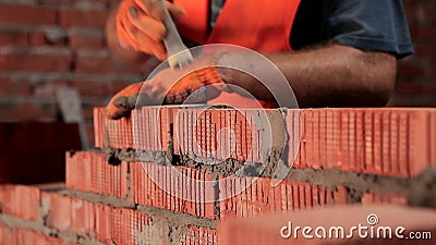 The Builder is Laying the Bricks. the Process of Building a Brick Wall ...