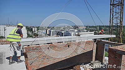 Builder Worker in Safety Protective Equipment Installing Concrete Floor ...