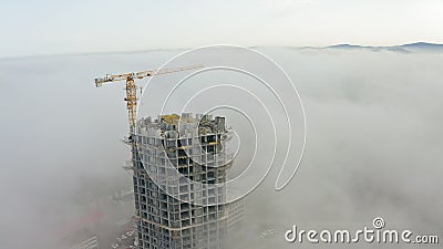 A Building Under Construction Made of Monolithic Concrete Shrouded in ...