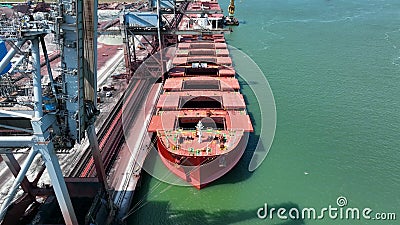 Bulk Carrier Ship Offloading Cargo by Crane for Processing Stock ...