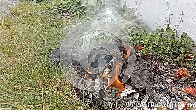 Burning plastic trash stock video. Video of burning - 262247727