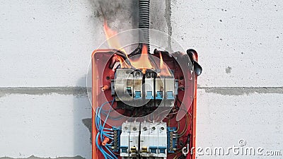 Burning Switchboard from Overload or Short Circuit on the Wall Stock ...