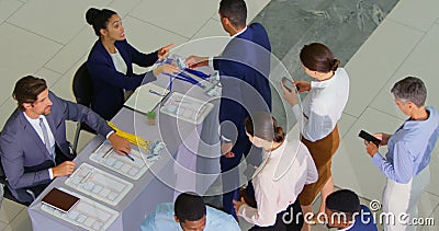 Business People Checking in at Conference Registration Table 4k Stock ...