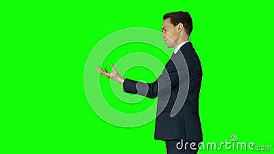 Businessman Lifting Something on His Hand on Green Screen Stock Footage ...