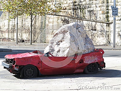 Car Crushed By Rock Stock Photos - Image: 24877213
