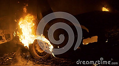 Car in Fire at Night, Burning Car Wheel, Rear View Stock Video - Video ...