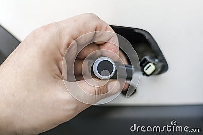 Car Mechanic Changes The Parking Sensor On The Car, The Sensor ...