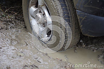 Car Stuck, Car Wheel In A Dirty Puddle, Rough Terrain Royalty-Free ...