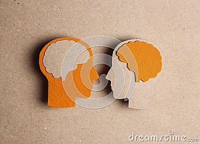 Cardboard Profiles With Brain Symbol On A Brown Background.. World ...