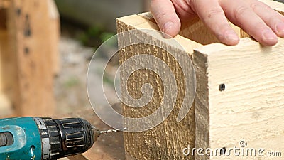 Carpenter Drilling Wood Using Portable Drilling Machine. Stock Footage ...
