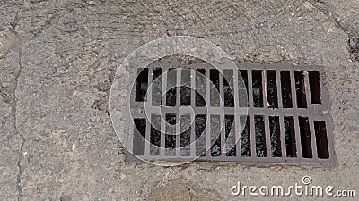 Cast Iron Grid of Storm Drain during Rain Close-up Stock Footage ...
