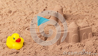 Castles And Coliseum With Flag, Rubber Duck In Sand. Royalty-Free Stock ...