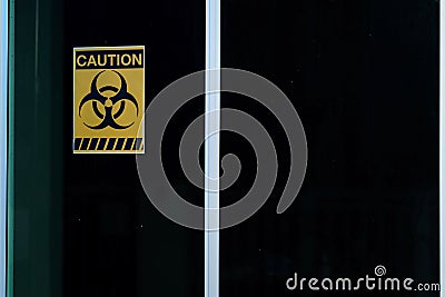 Caution Danger Sign. Hazard Warning Signs On Glass Window In Laboratory ...