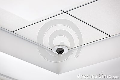 CCTV Camera In The Corner On A White Suspended Ceiling. Stock Image ...