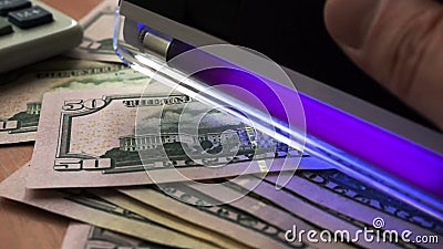 Checking Bills with Uv Light. Dollars Under Ultraviolet. Stock Video ...