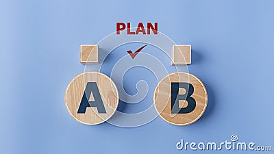 Checking The PLAN A Or B On Wooden Blocks With The Words Plan A And B ...