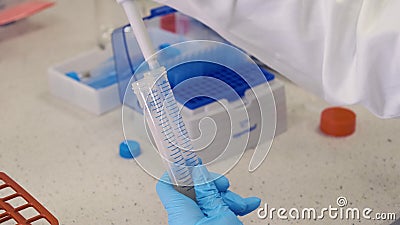 Chemist Transfer Sample from One Test Tube To Another Using an ...