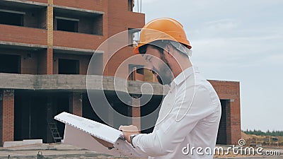 Chief Architect at Construction Site. Chief Architect in a Hard Hat at ...