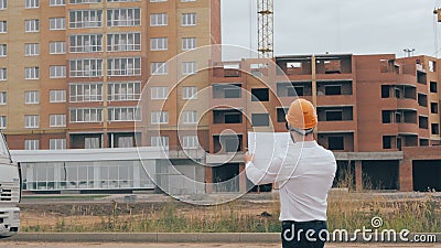 Chief Architect at Construction Site. Chief Architect in a Hard Hat at ...