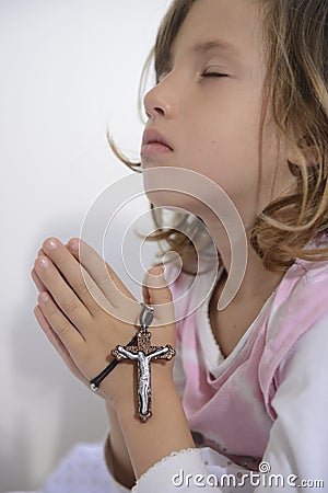 Child Praying With Cross Royalty Free Stock Photography - Image: 32936077