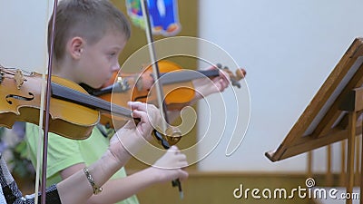 Child Boy Student Playing Violin with Teacher in Music Lesson at ...