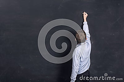 Child Writing On Black Chalkboard Royalty Free Stock Photo - Image ...