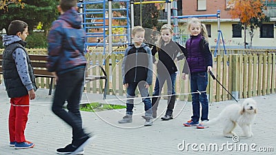 Children Playing Rubber Band Jumping Game Stock Video - Video of french ...