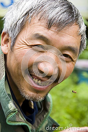 Chinese bee farmer - Stock Image - Everypixel