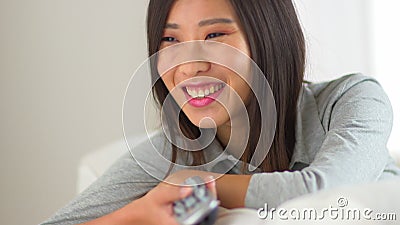 Chinese Woman Flipping through Channels Stock Footage - Video of asian ...