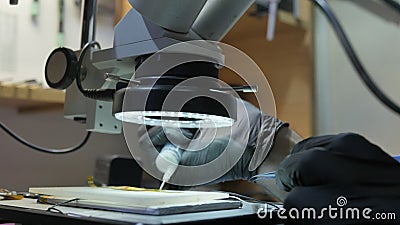 Chip Repair Under a Microscope Stock Footage - Video of microchip ...