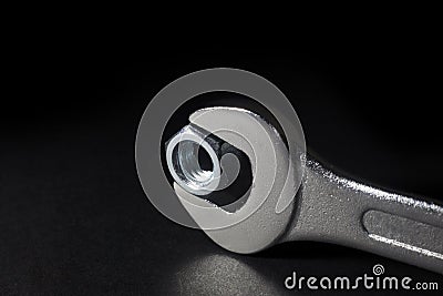 Chrome-Vanadium Spanner Gripping Nut On Black Stock Photography ...