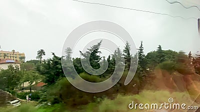 Cinematic 4k UHD Elevated View from the Train Rainy Window Over the ...