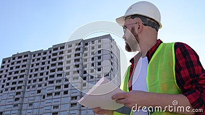 Civil Engineer Checking Work for Communication To Management Team in ...