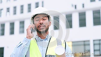 Civil Engineer on a Phone Call while at a Construction Site Discussing ...