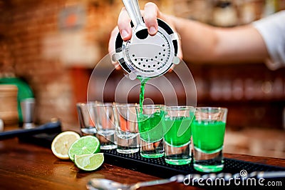Close-up Of Bartender Hand Pouring Alcoholic Drink Stock Image ...