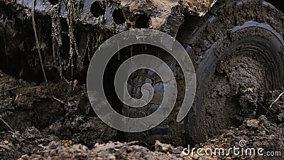 Close-up of a Car Wheel Stuck in the Dirty Water and Mud. Wheel is ...