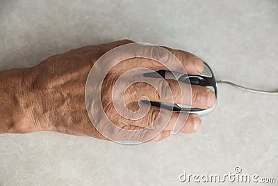 Close-up Of An Elderly Man`s Hand On A Computer Mouse. Older People Are ...