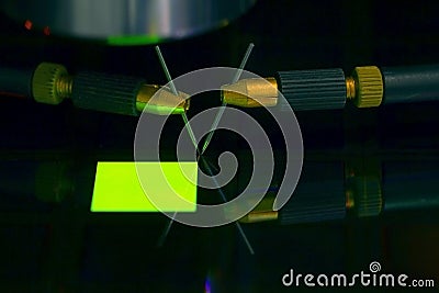 Close Up Of Examining A Sample Of OLED Display With Probe Station Under ...