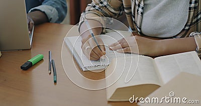Close-up of Hands Students Studying at Table Using Laptop Typing and ...