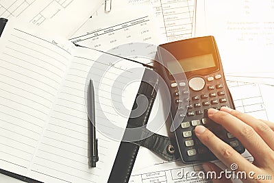 Close-up Of Human Accountant Making Calculations While Sitting At Desk ...